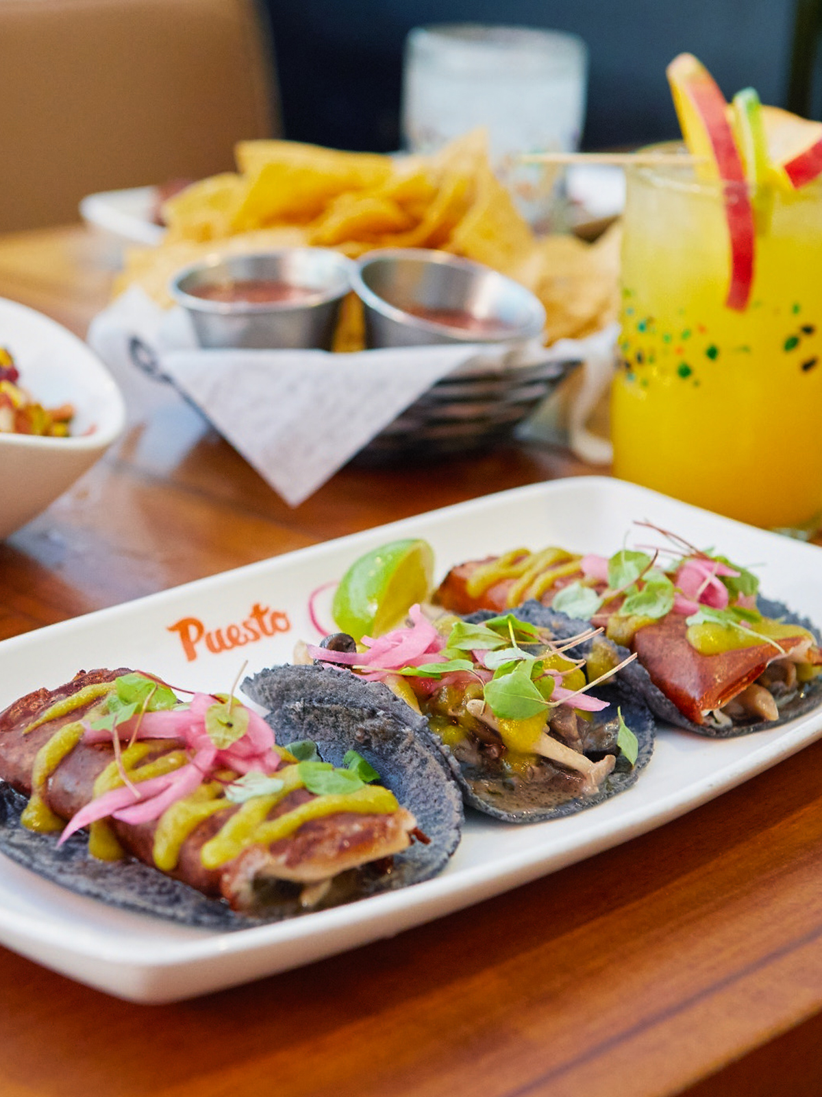 See you on the patio at Puesto