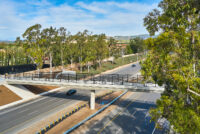 New pedestrian bridge opens key link in 363-mile network